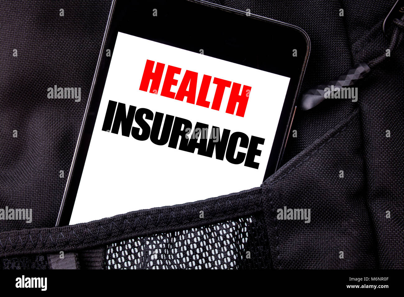 Handwritten text showing Health Insurance. Business concept writing for ...