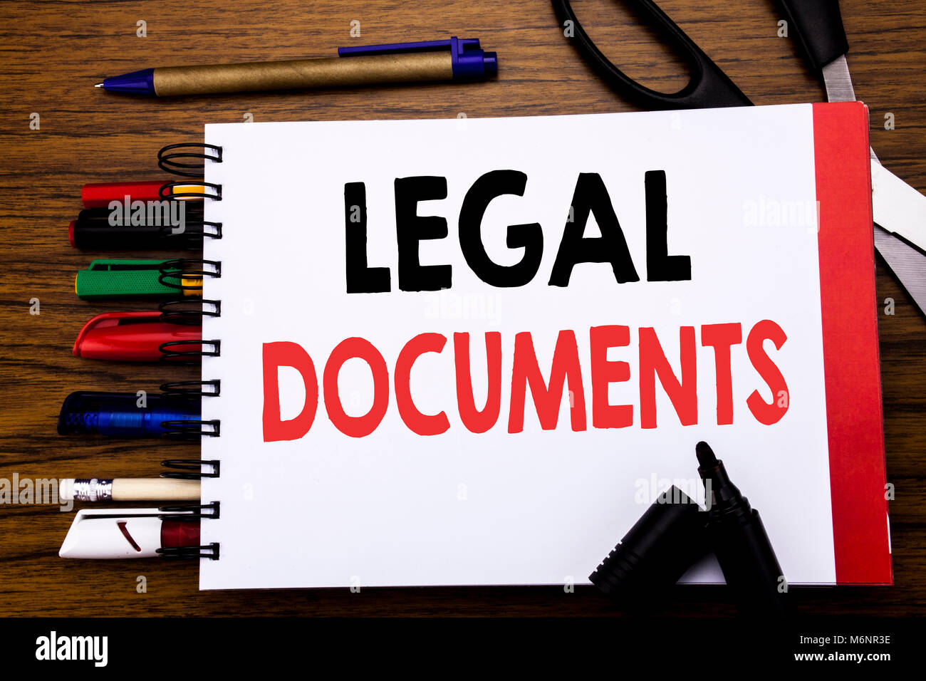 Handwritten text showing Legal Documents. Business concept for Contract ...