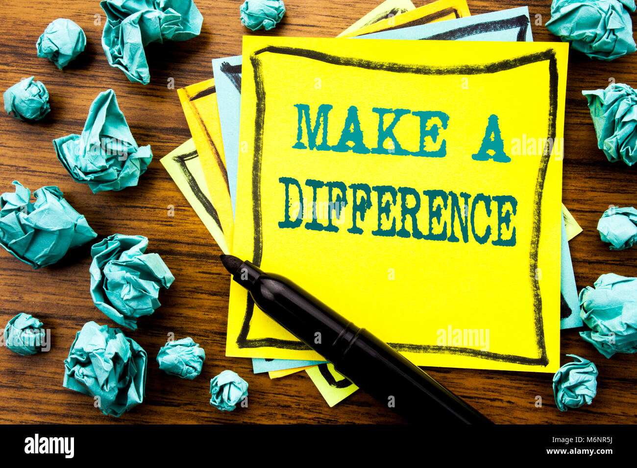 Handwritten text showing Make A Difference. Business concept for ...