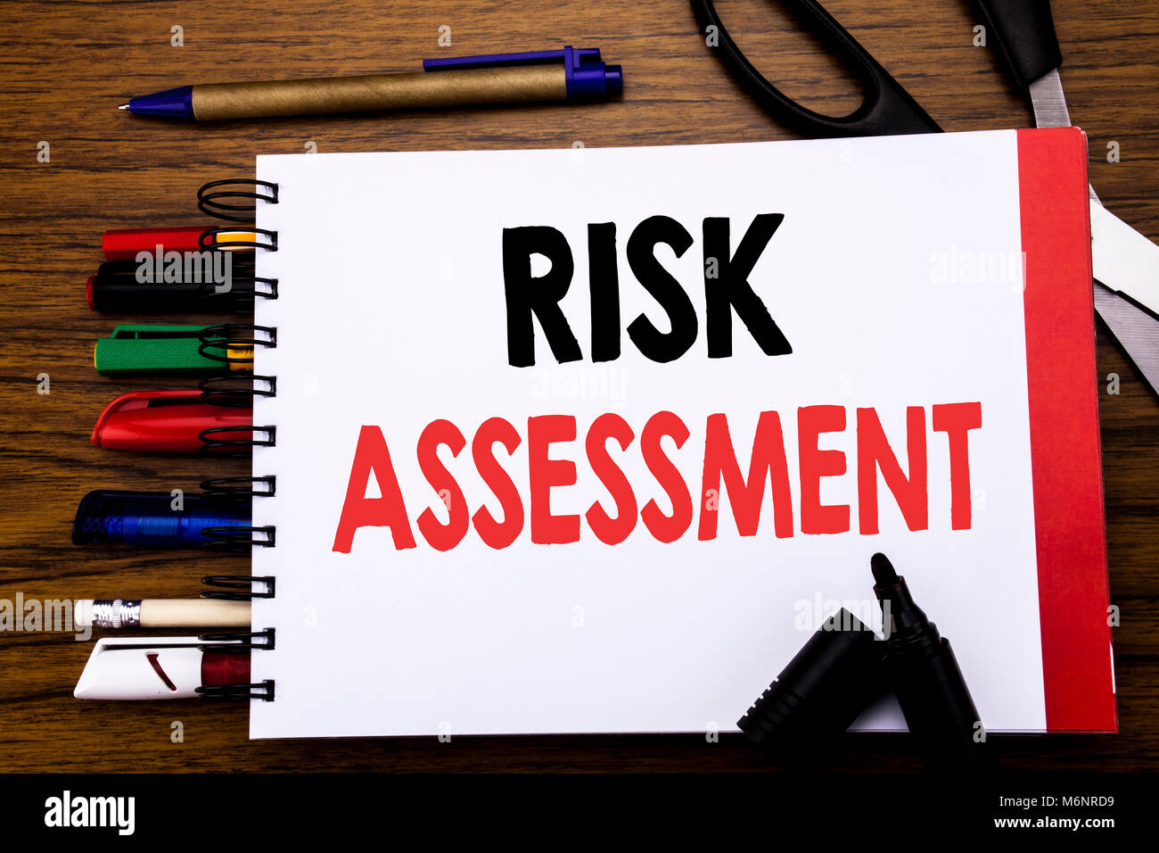 Handwritten text showing Risk Assessment. Business concept for Safety ...