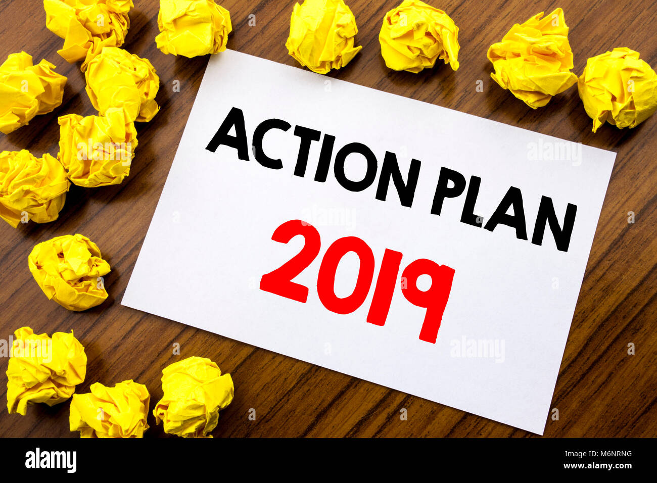 Handwritten text showing word Action Plan 2019. Business concept ...