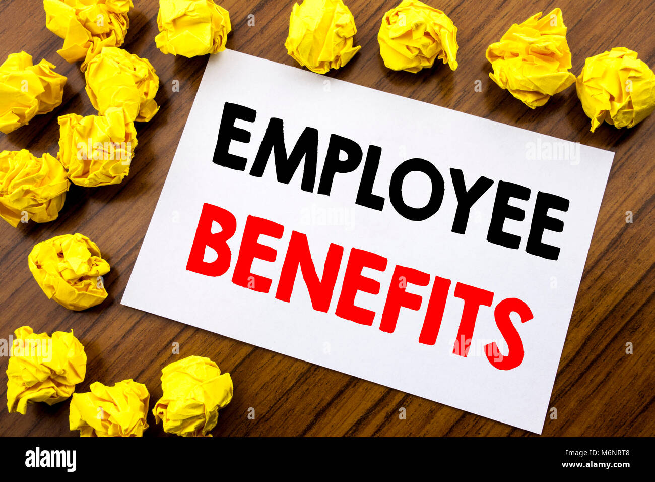 Handwritten text showing word Employee Benefits. Business concept ...