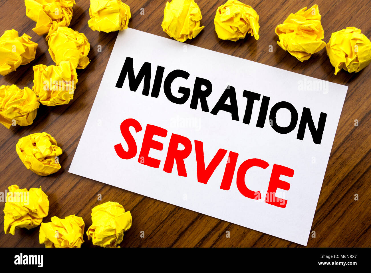 Handwritten text showing word Migration Service. Business concept ...