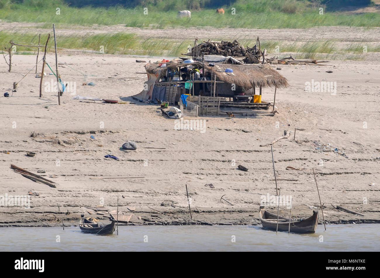 A view of the Irrawaddy River in Myanmar Burma with small fishermen ...