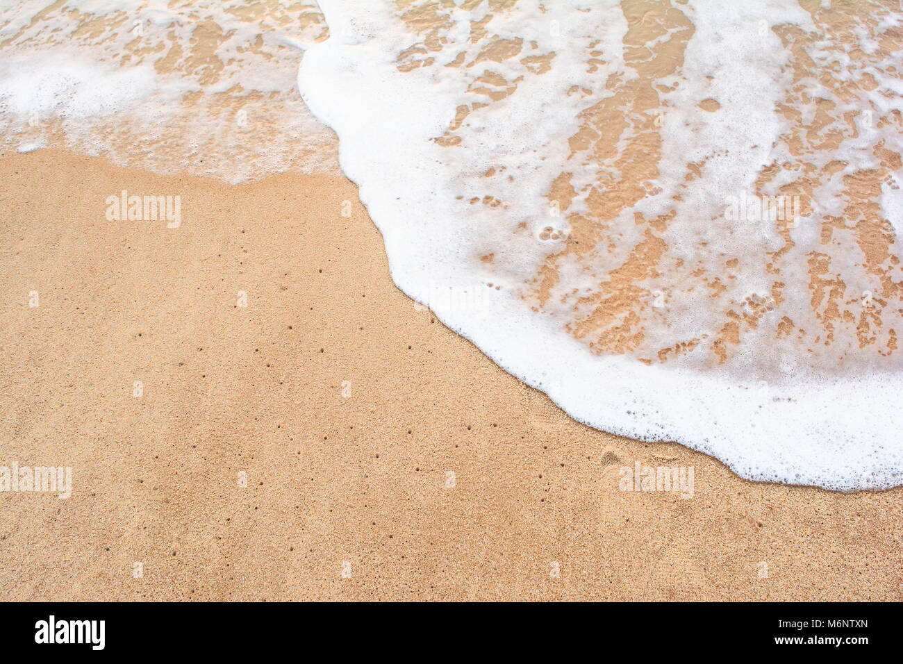 Transparent sea water flowing sandy hi-res stock photography and images ...