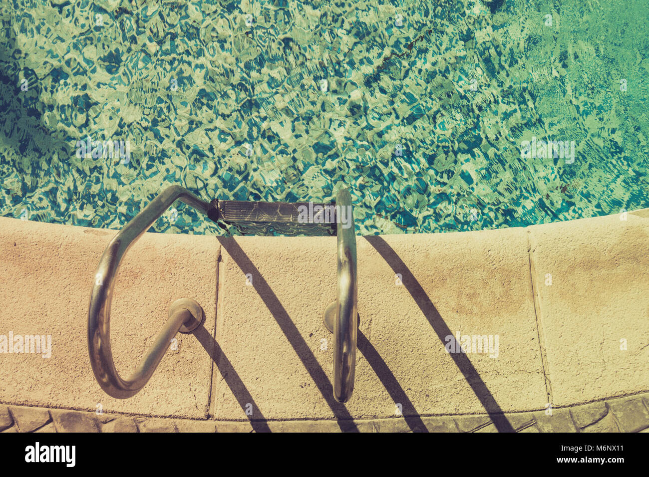 Curved side of a swimming pool Stock Photo - Alamy