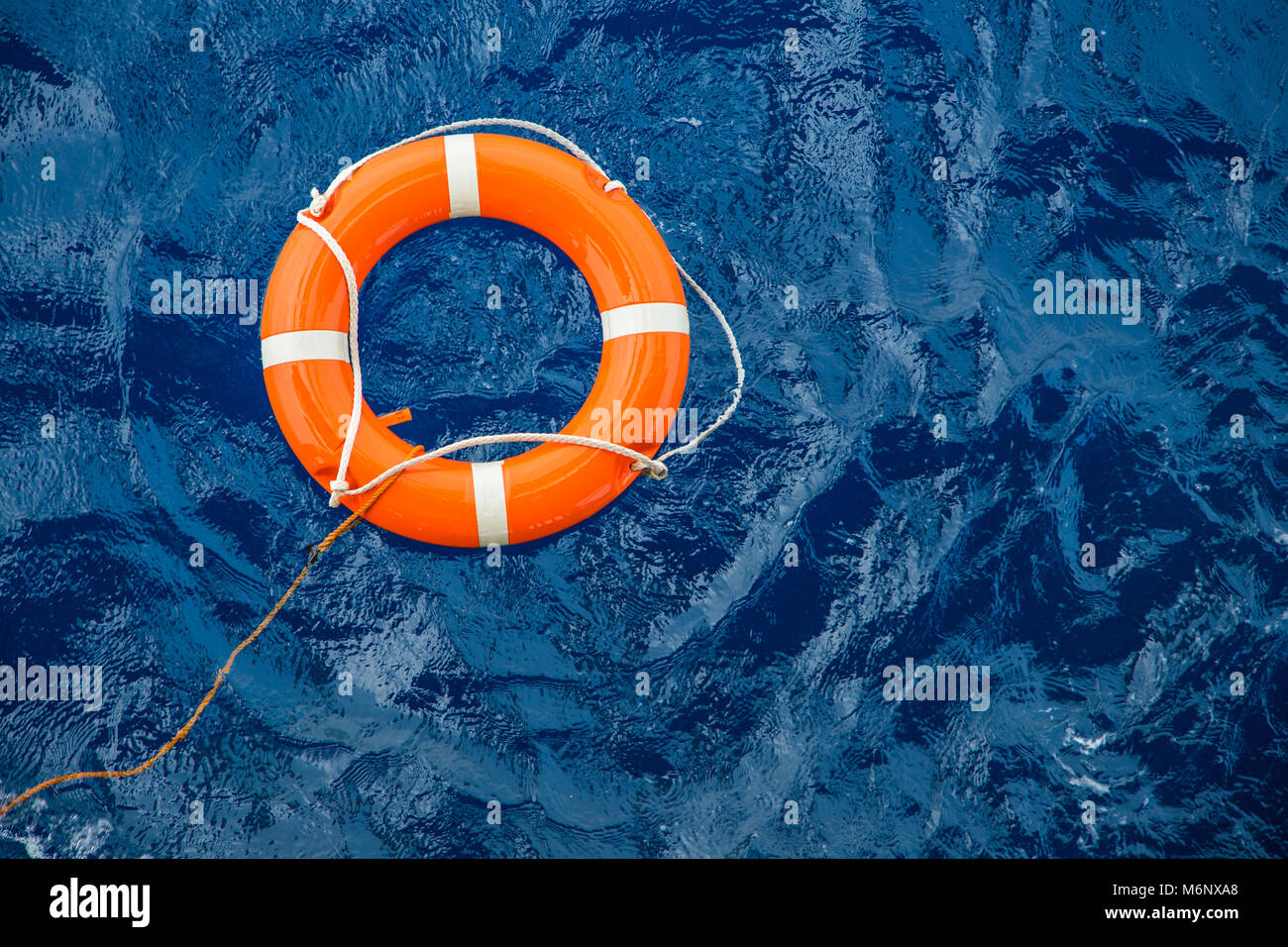 Safety Equipment Life Buoy Or Rescue Buoy Floating On Sea To Rescue