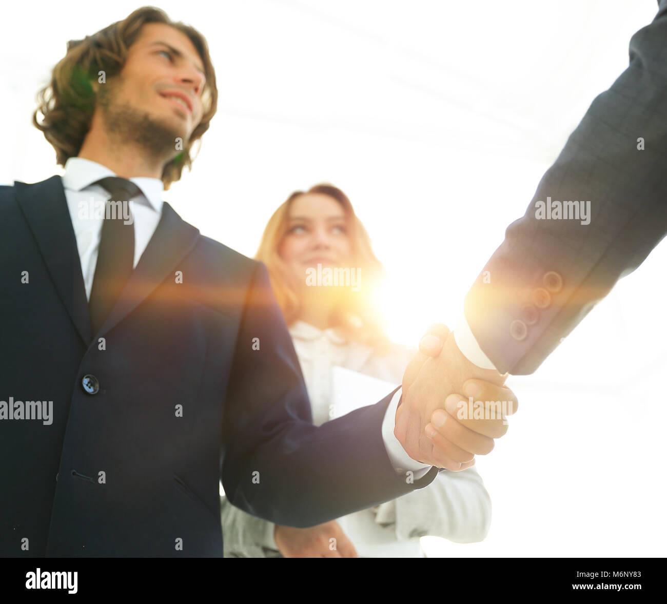 Photo of handshake of two happy businessmen Stock Photo - Alamy