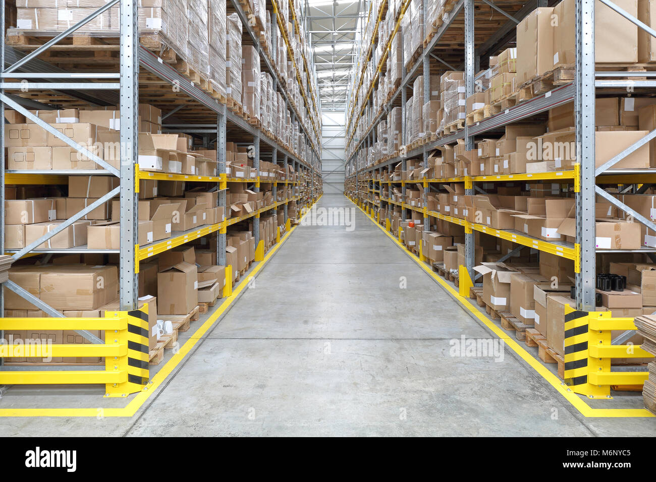 Long Aisle With Shelves in Fulfillment Warehouse Stock Photo - Alamy