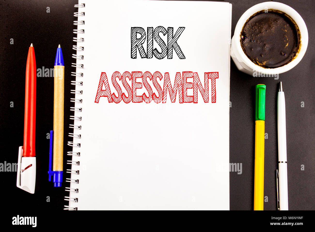 Writing text showing Risk Assessment. Business concept for Safety ...