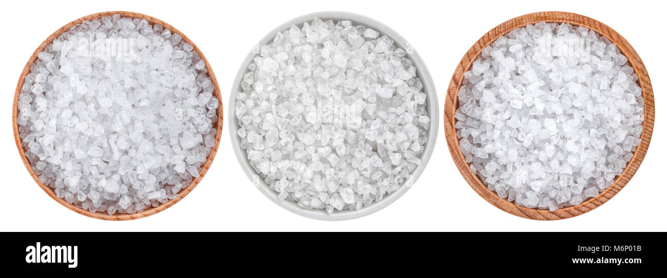 Sea salt in bowl isolated on white background closeup, top view Stock ...