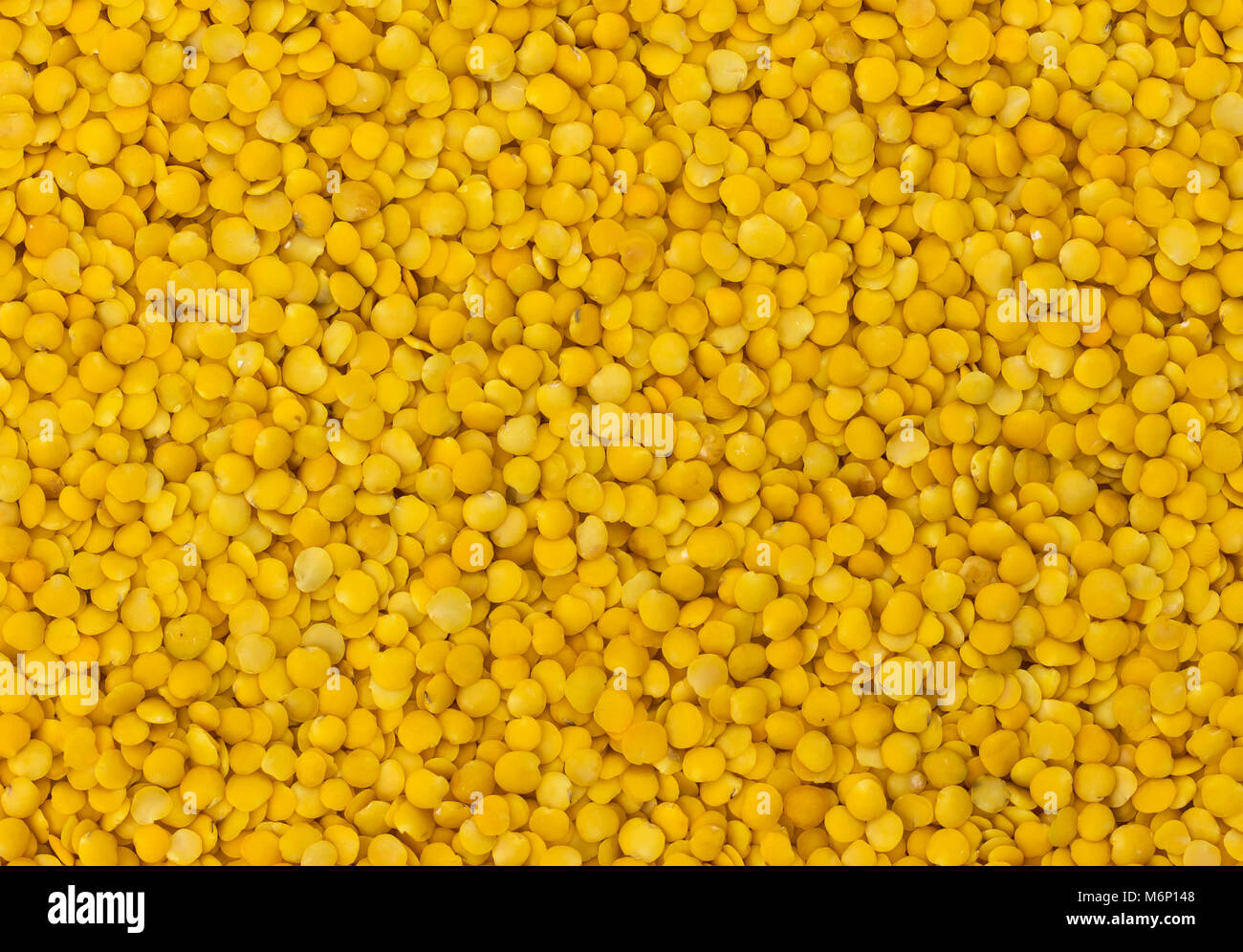 Yellow lentils grain texture Stock Photo - Alamy