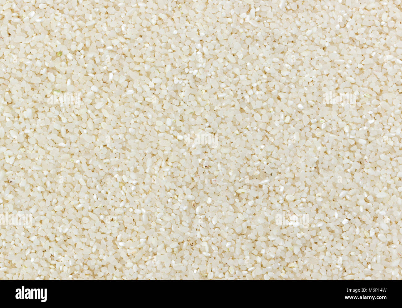 Crushed rice texture Stock Photo - Alamy