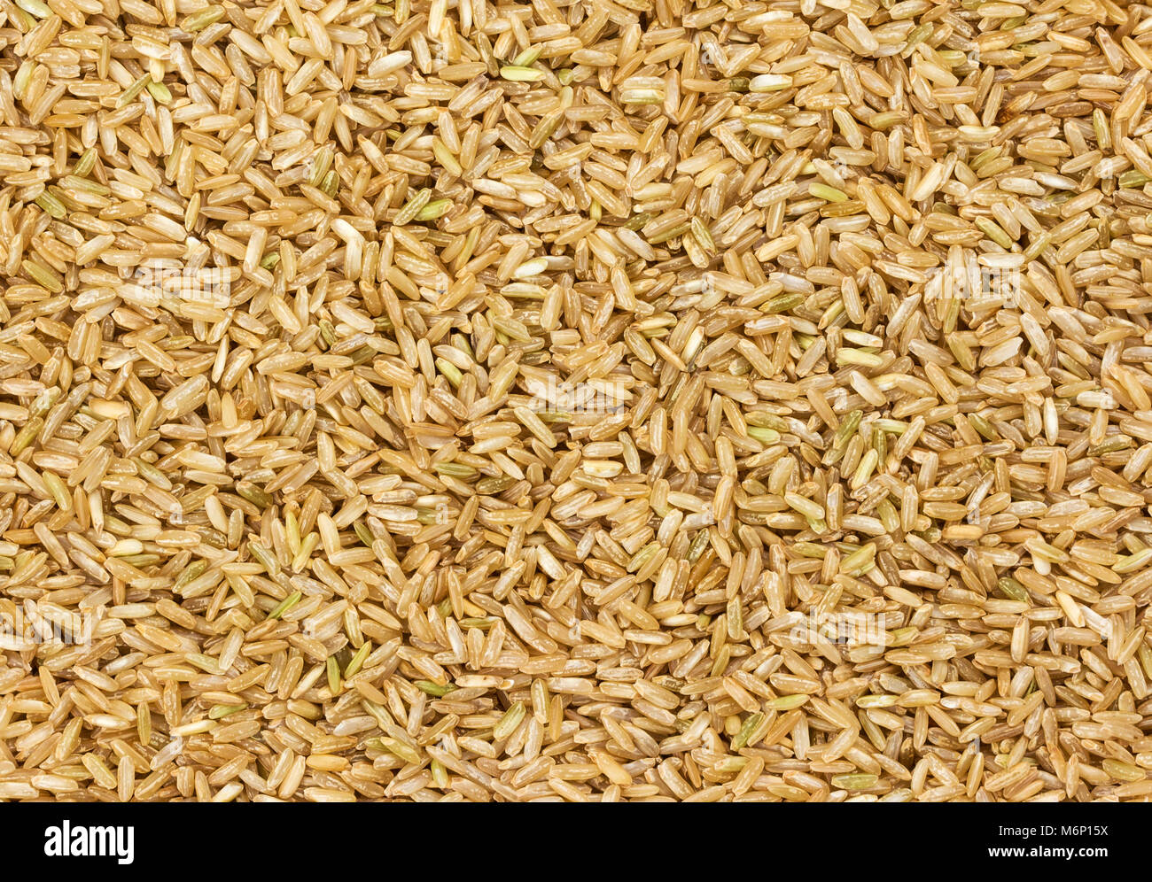 Brown rice texture Stock Photo - Alamy