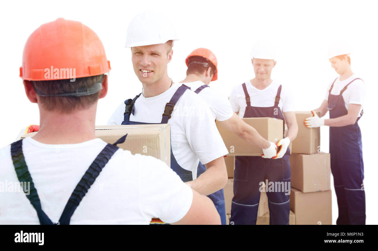 Group of people builders with boxes Stock Photo - Alamy