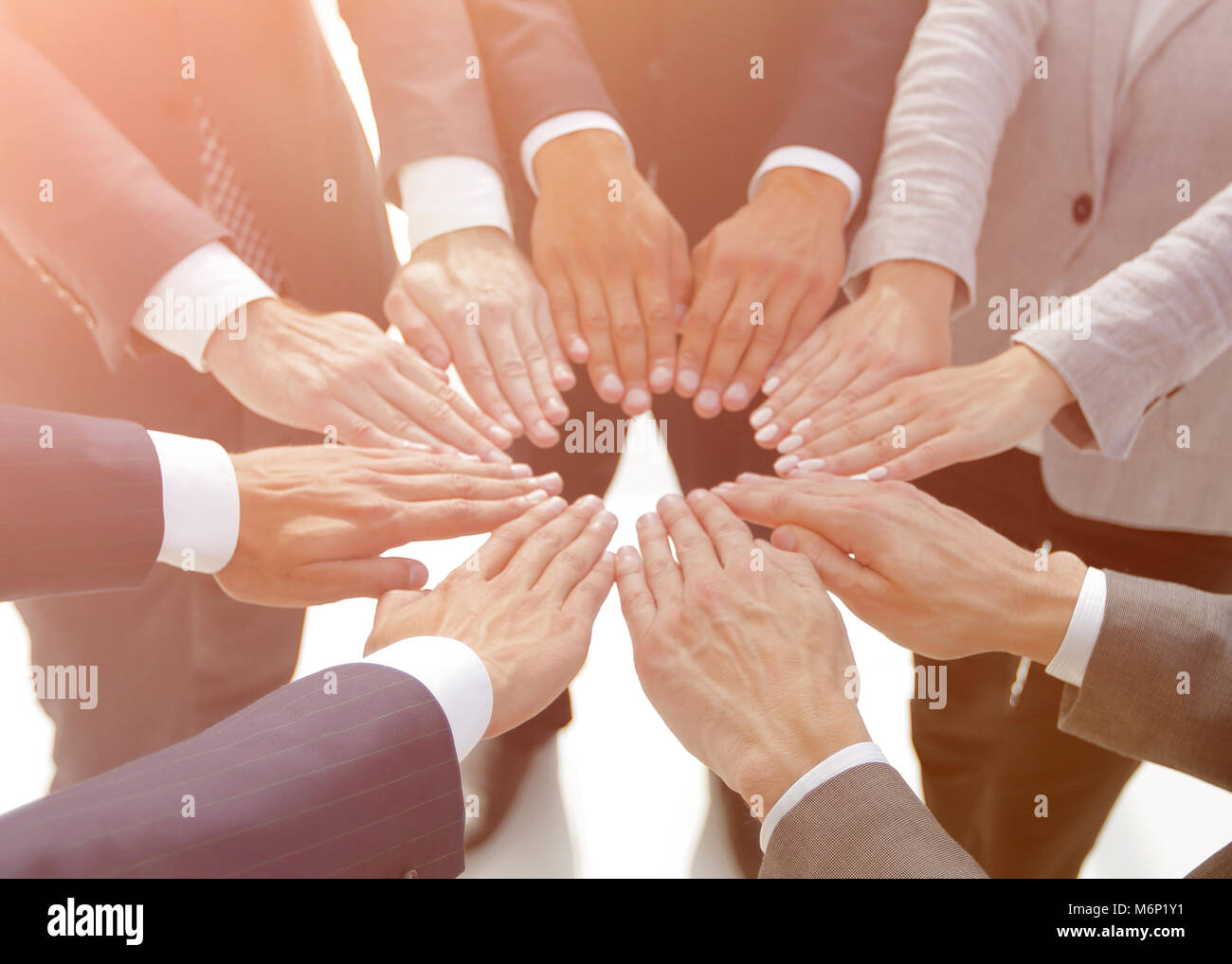 business people giving each other their hands Stock Photo - Alamy