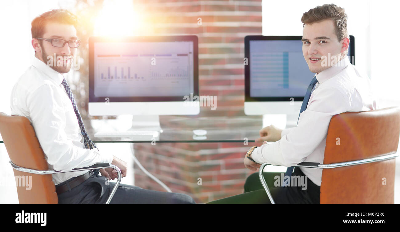 managers work with financial charts Stock Photo - Alamy