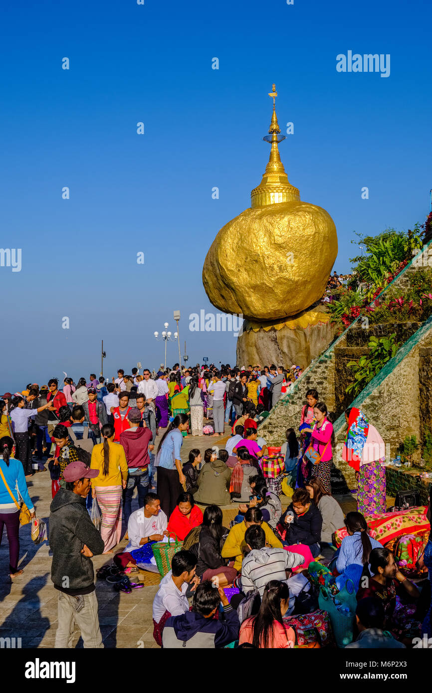 The Kyaiktiyo Pagoda, the Golden Rock, at the top of Mt. Kyaiktiyo is ...