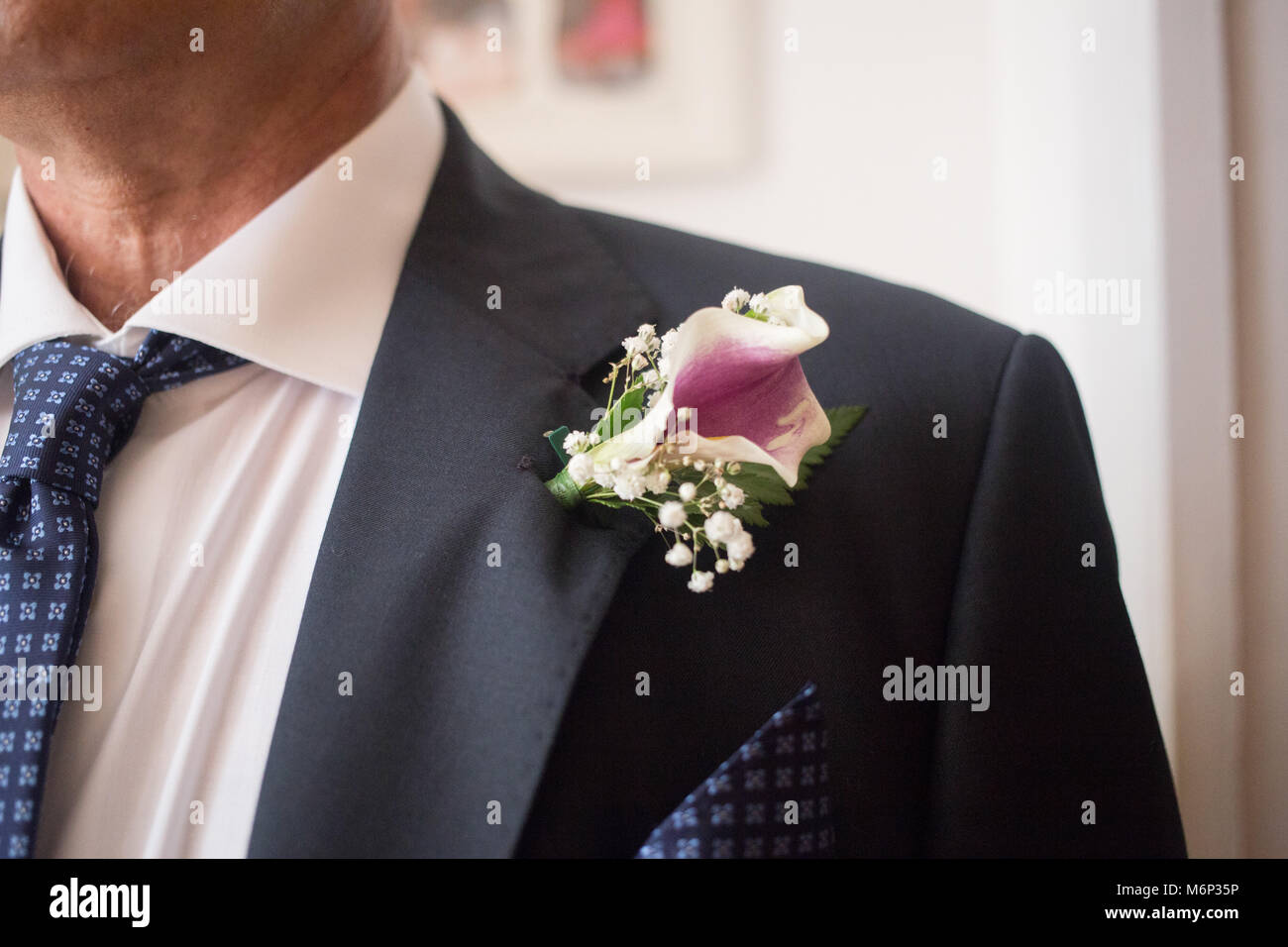 Detail of the flower on the suit of the bride's father, on the wedding ...