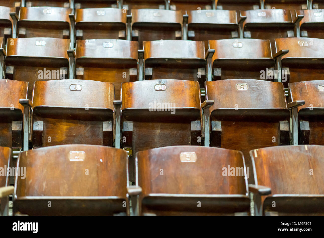 Wooden chairs in the circus Stock Photo - Alamy