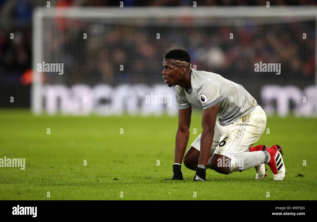 Manchester United's Paul Pogba gets up from the ground during the ...