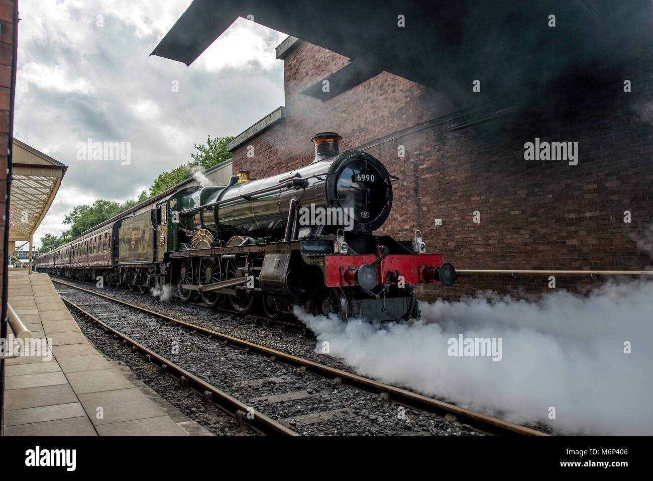 Steam Train in Landscape Stock Photo - Alamy