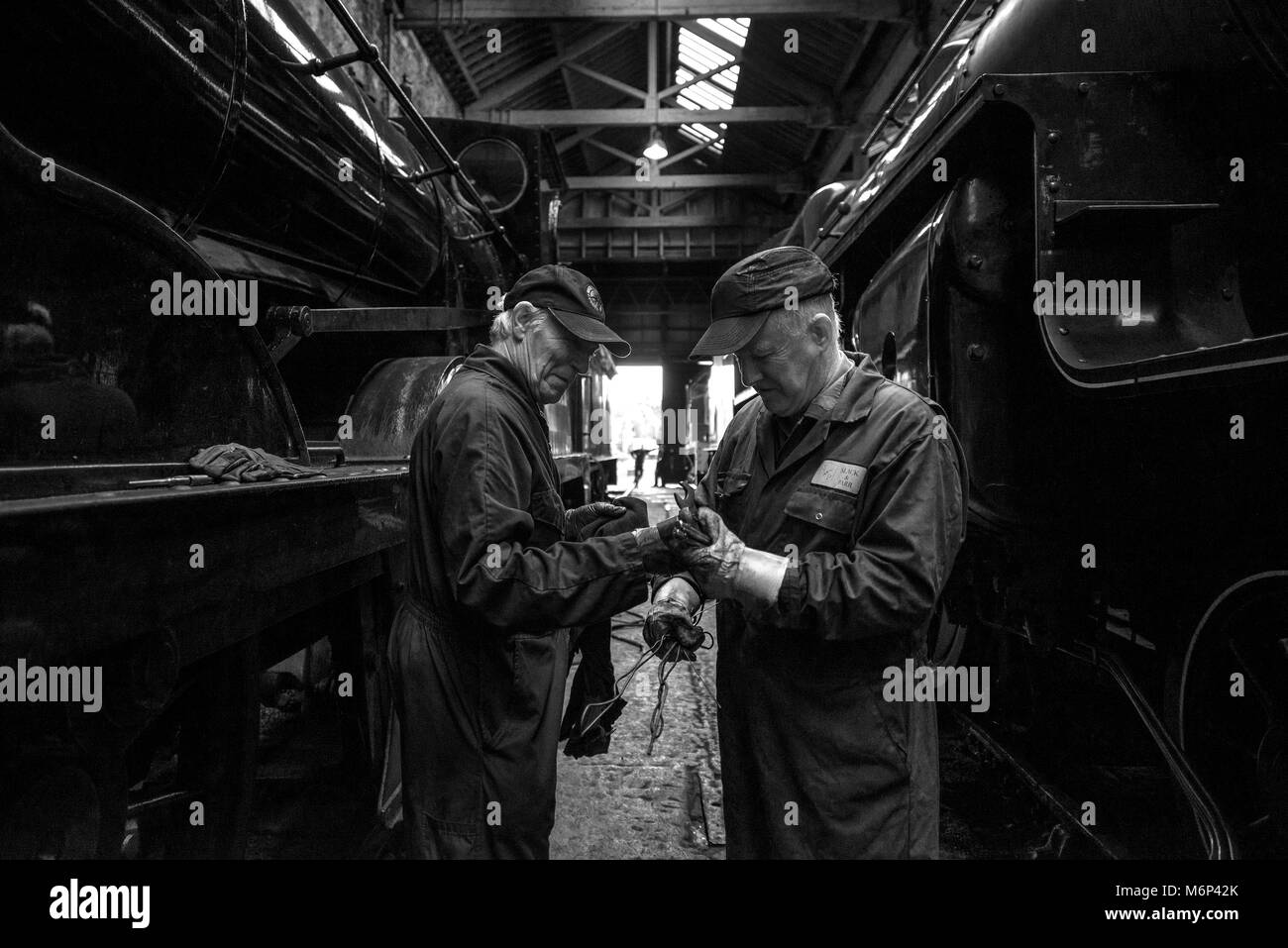 Working on train tracks Black and White Stock Photos & Images - Alamy