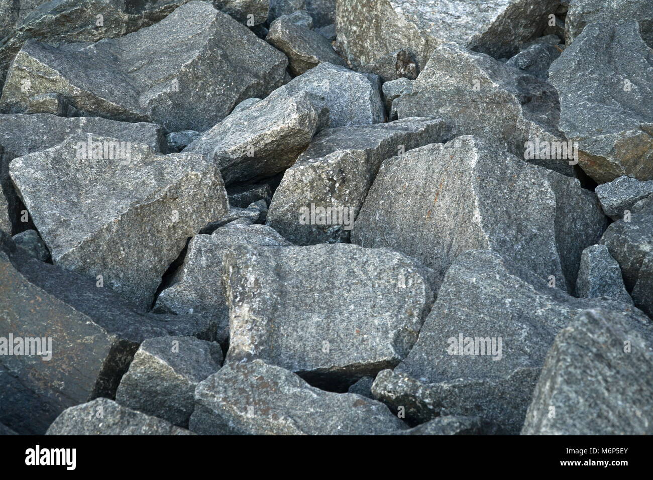 Shoreline rocks make for a textured background photo. Computer ...
