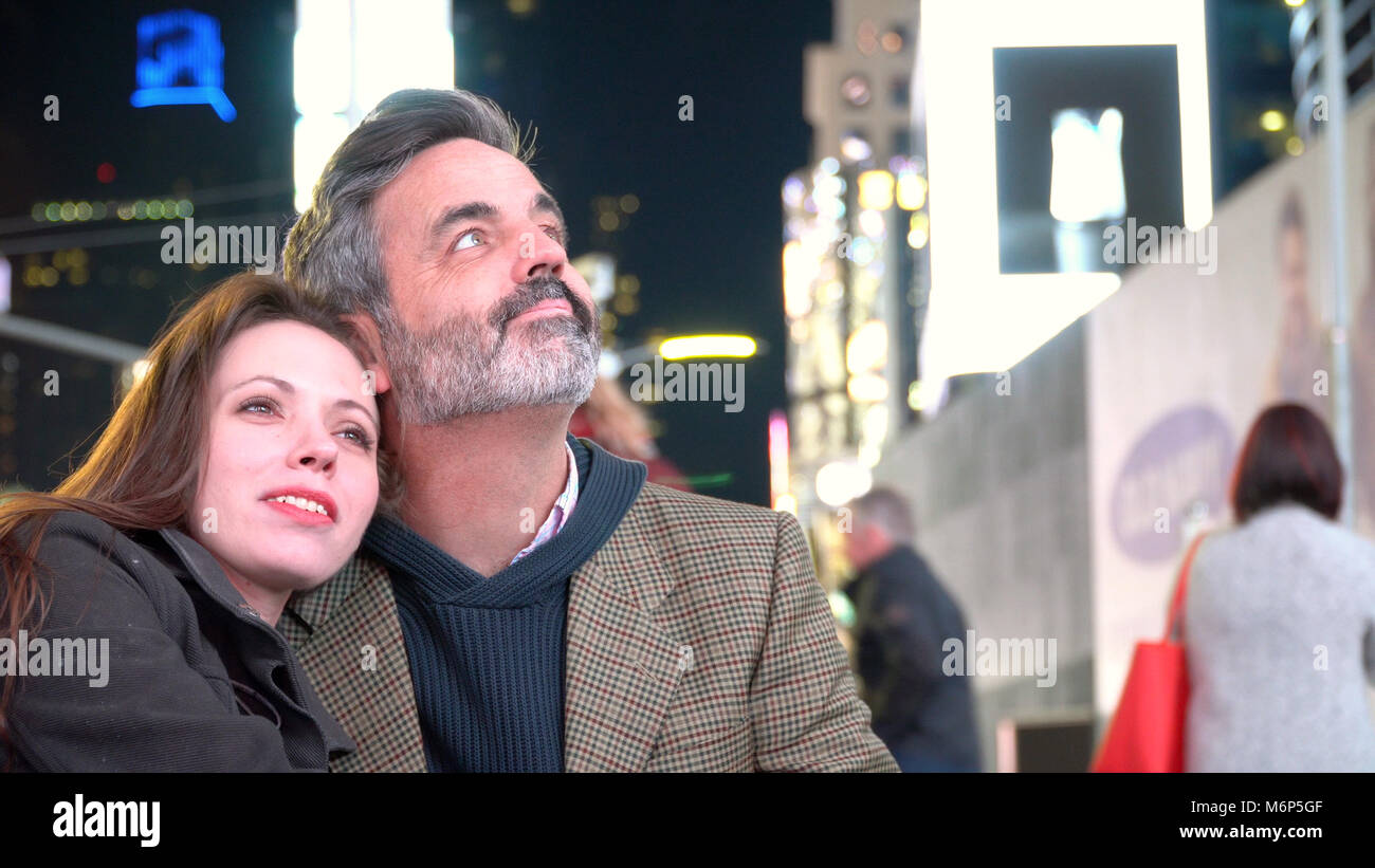 Young affectionate happy newlywed couple on honeymoon in New York City ...