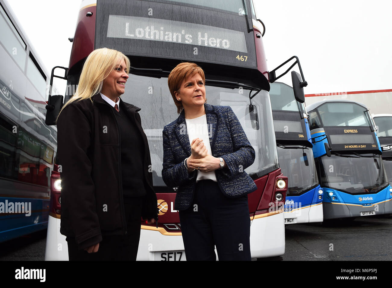First Minister Nicola Sturgeon (right) meets Charmaine Laurie, a bus ...