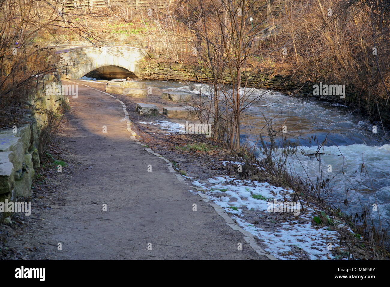 Outside nature stock photo winter season stream flowing under a small ...