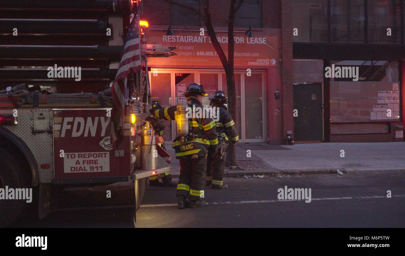 New York City - December 2016: FDNY Fire Department firefighters stand ...