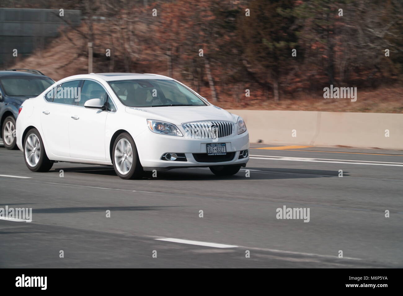 Long Island, New York - Circa 2017: White Buick sedan driving on ...