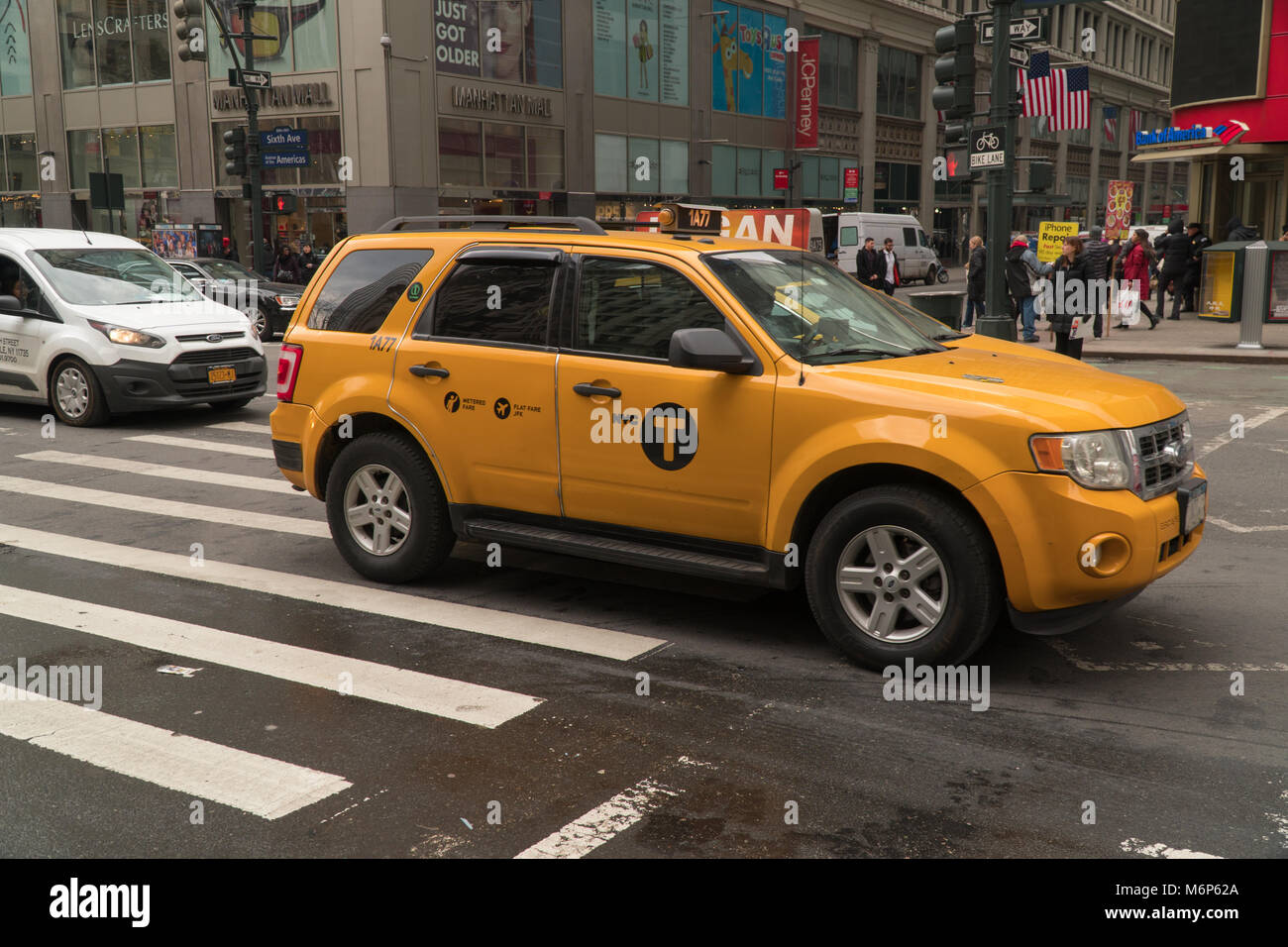 New York City - Circa 2017: Yellow taxi cab driving in streets of ...