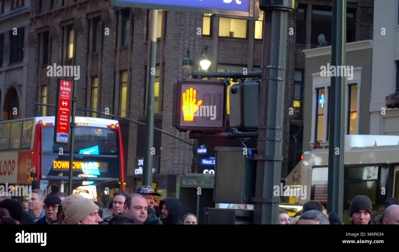 New York City - Circa 2017: Illuminated stop walk symbol on street lamp ...
