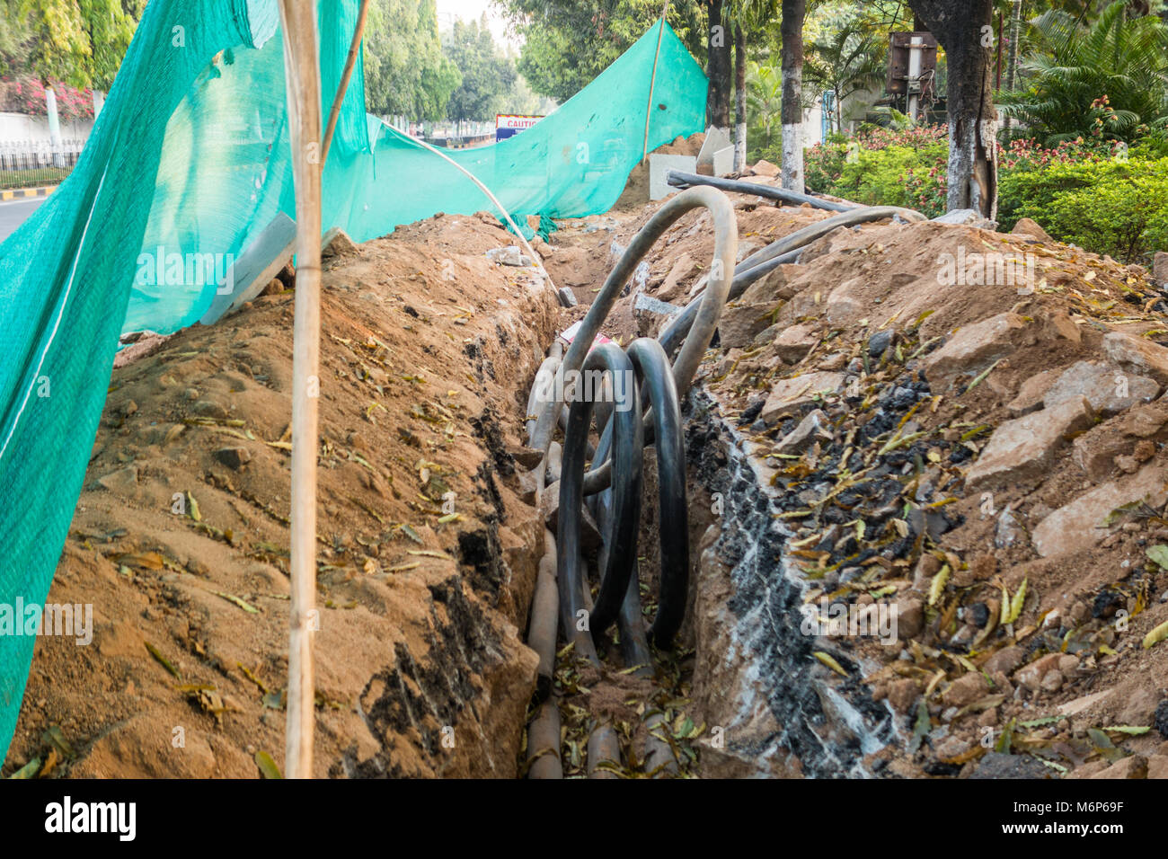 Electricity cabling work in progress in India Stock Photo - Alamy