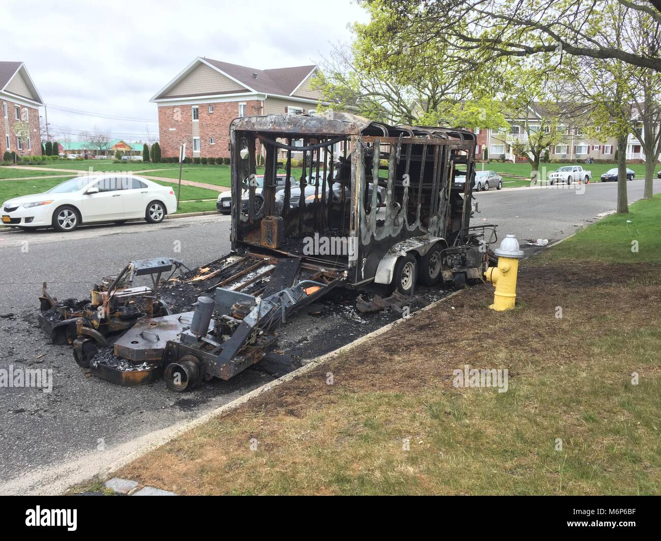 Aftermath of a landscaping truck that caught fire in a residential ...