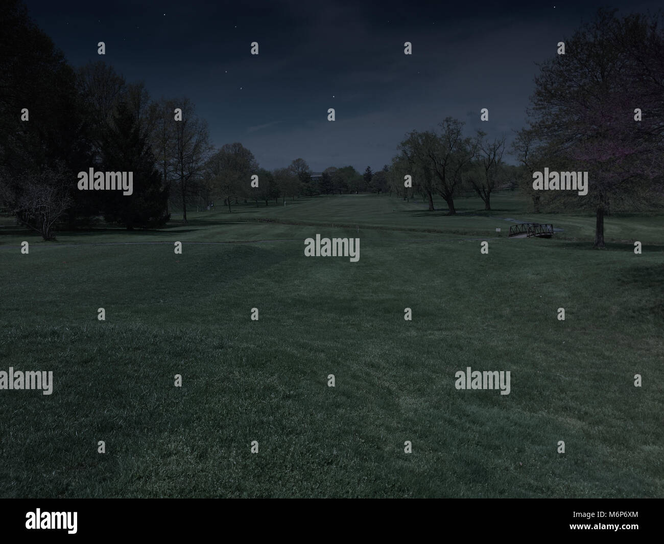 Beautiful view looking down the fairway of a public golf course at ...