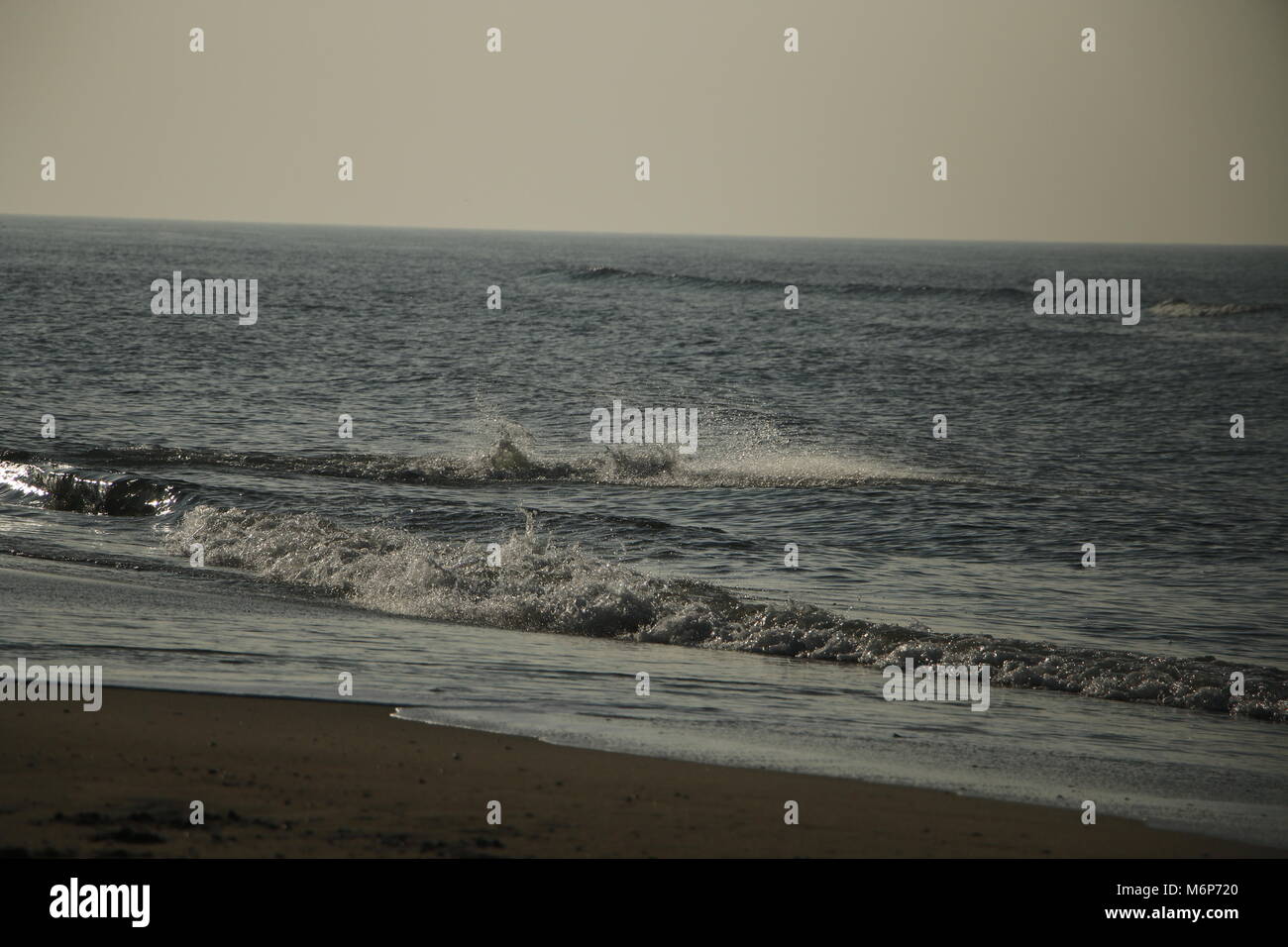 Low tide at the beach Stock Photo - Alamy