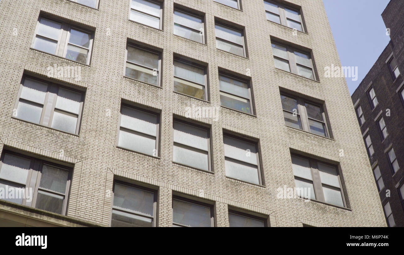 Exterior generic apartment building establishing shot photo day time ...