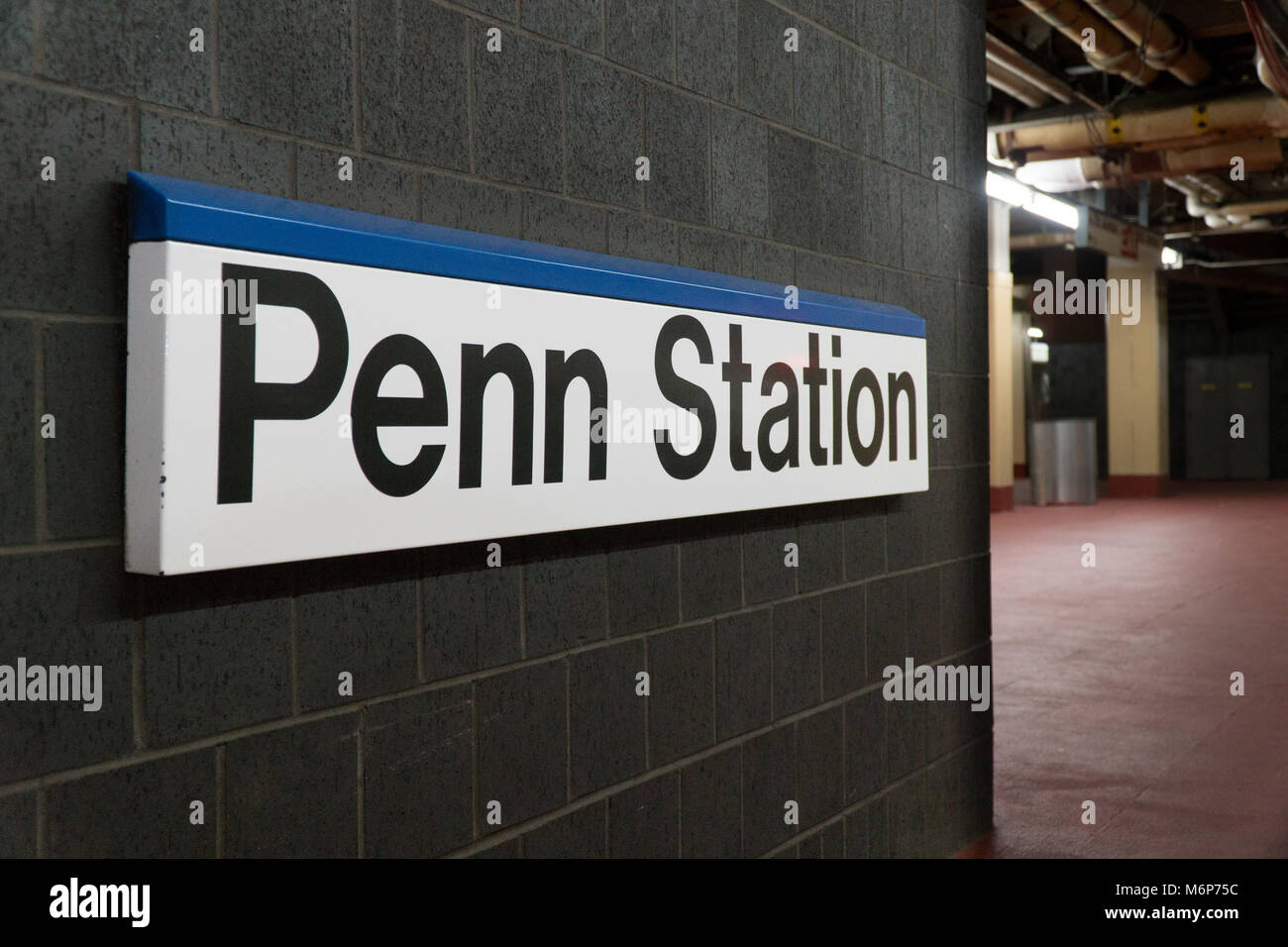 New York City, Circa 2017: Penn Station sign on underground platform ...