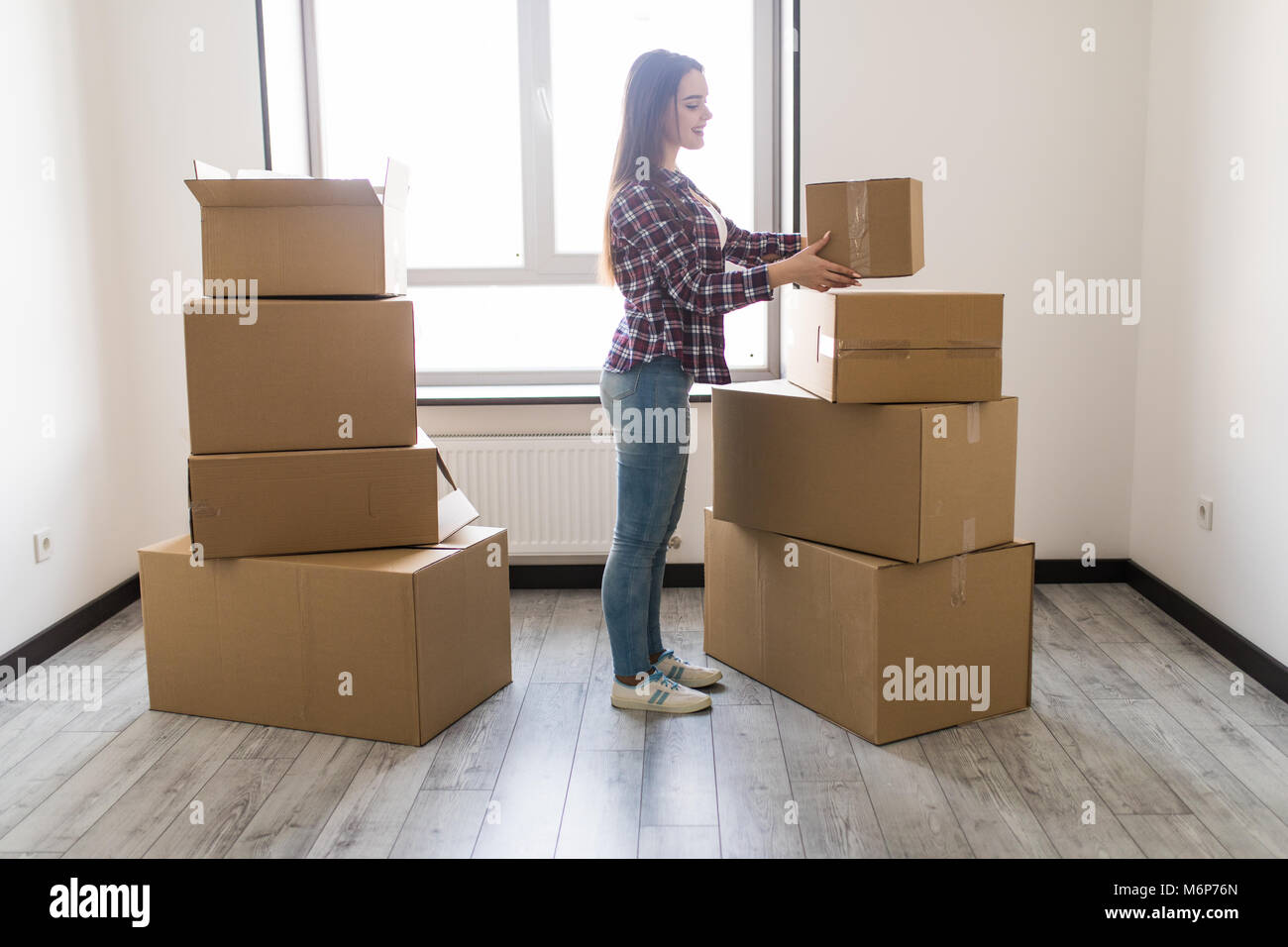 Unpacking goods hi-res stock photography and images - Alamy