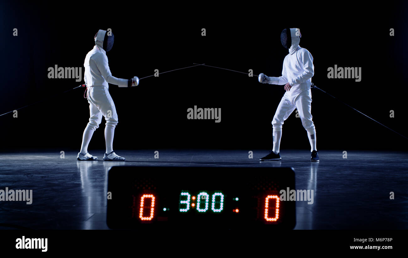 On the Championship Two Professional Fully Equipped Fencers Ready for ...