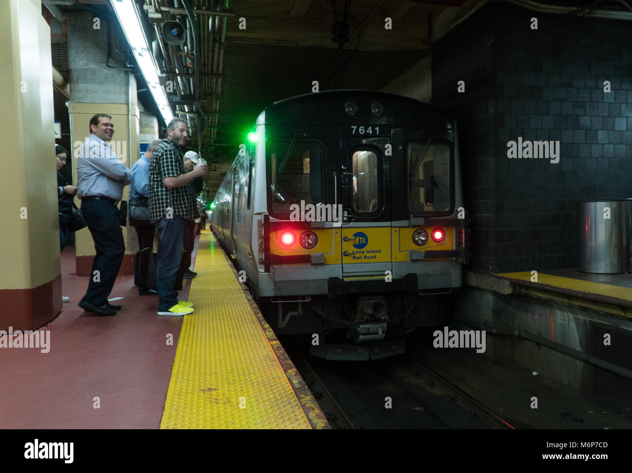 New York City, Circa 2017: Passengers wait for Long Island Railroad ...