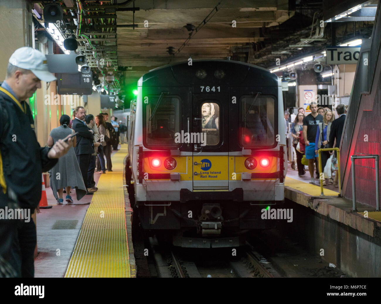 New York City, Circa 2017: Passenger wait on Penn Station platform to ...