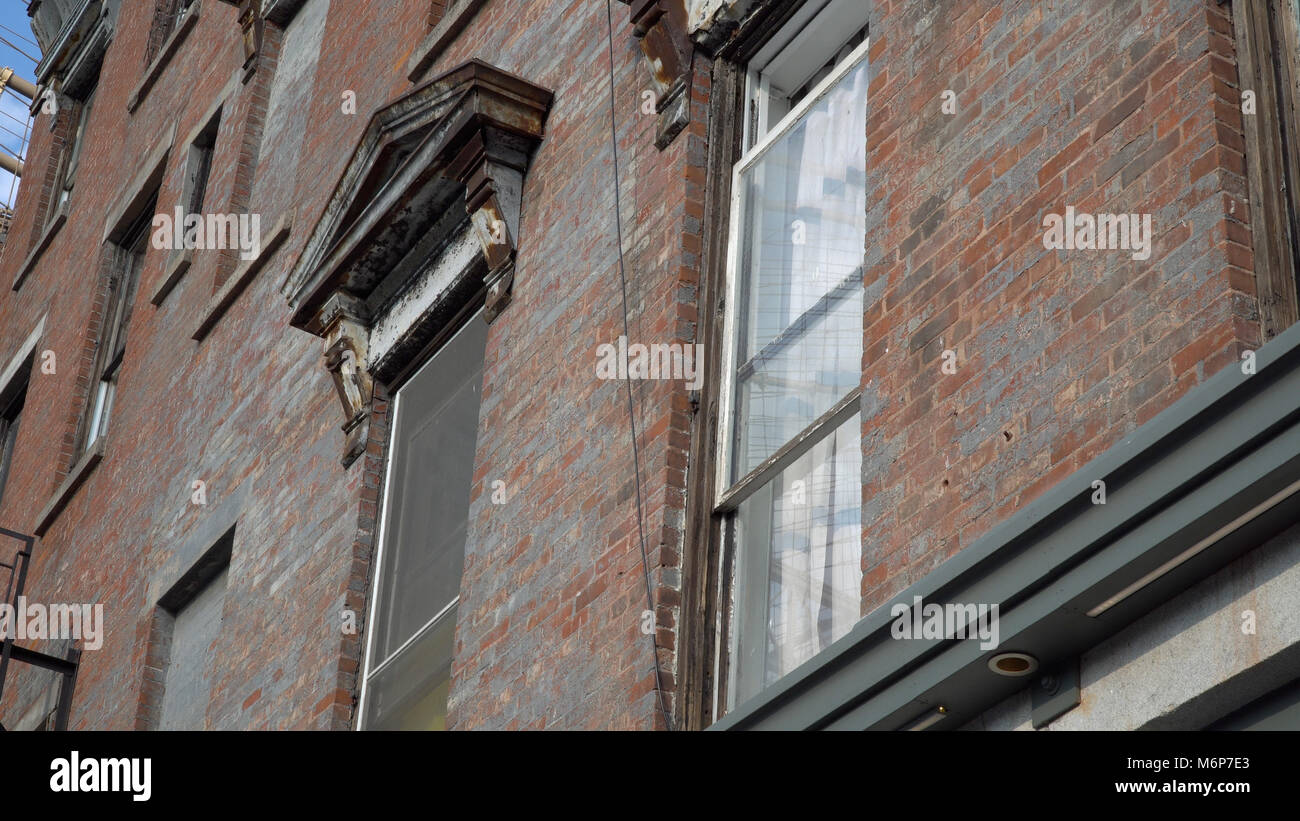 Close up exterior DX establishing photo of old vintage architecture ...