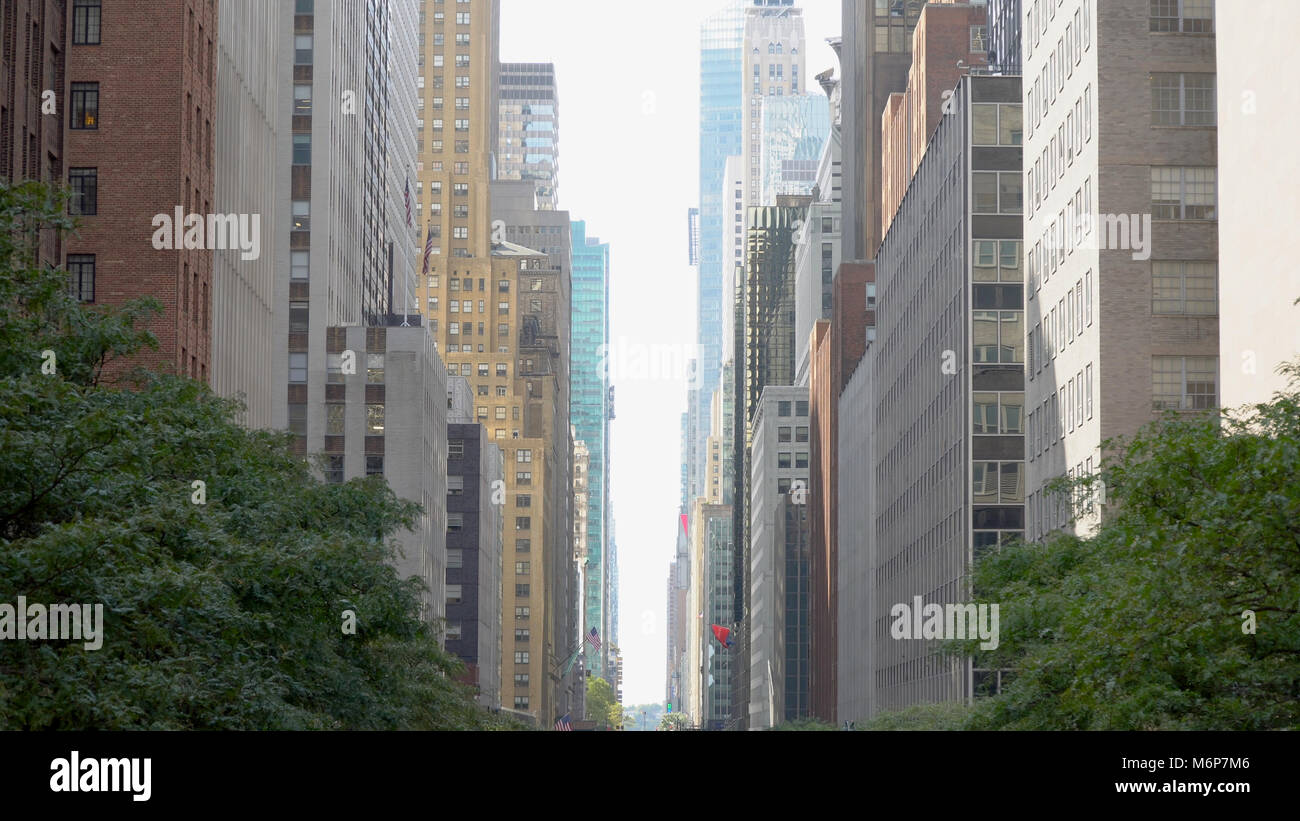 Long view of urban buildings overhead city street. Skyscrapers of ...