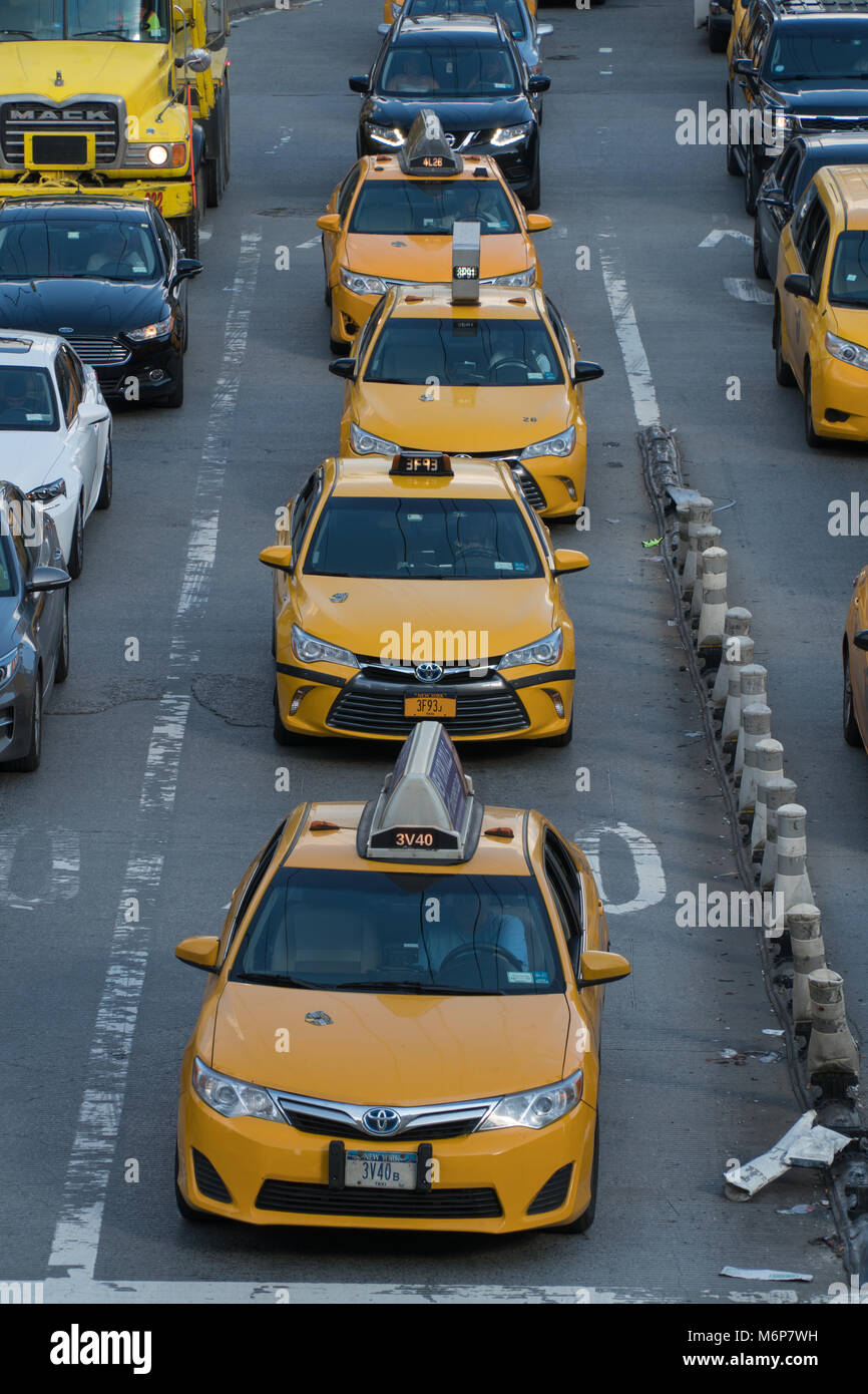 New York City, Circa 2017: Straight row of NYC yellow taxi cabs in line ...