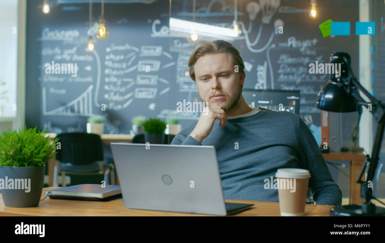 Handsome Young Office Employee Thinks on a Problem Solution While ...