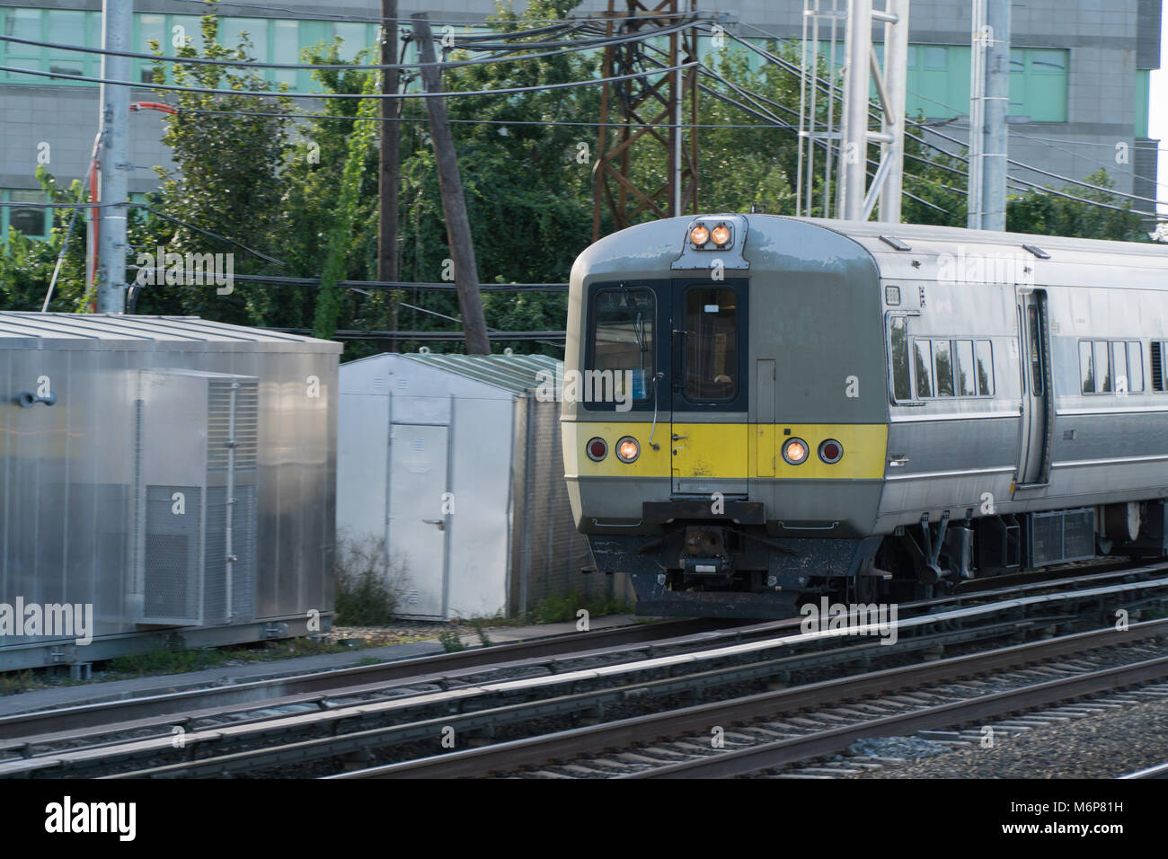 Busy generic train travel at high speed during rush hour commute bring ...